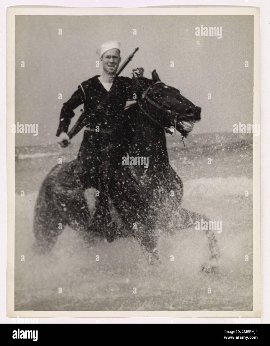 Coast Guard personnel are shown conducting beach patrols using horses ...