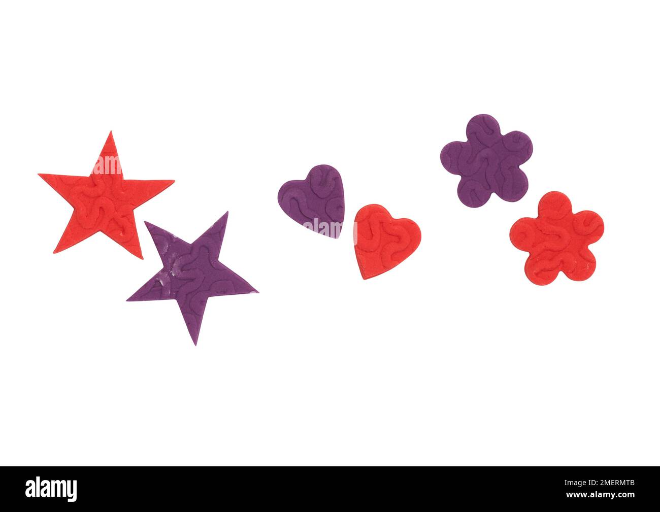 Fondant icing shapes, stars, hearts, flowers Stock Photo - Alamy