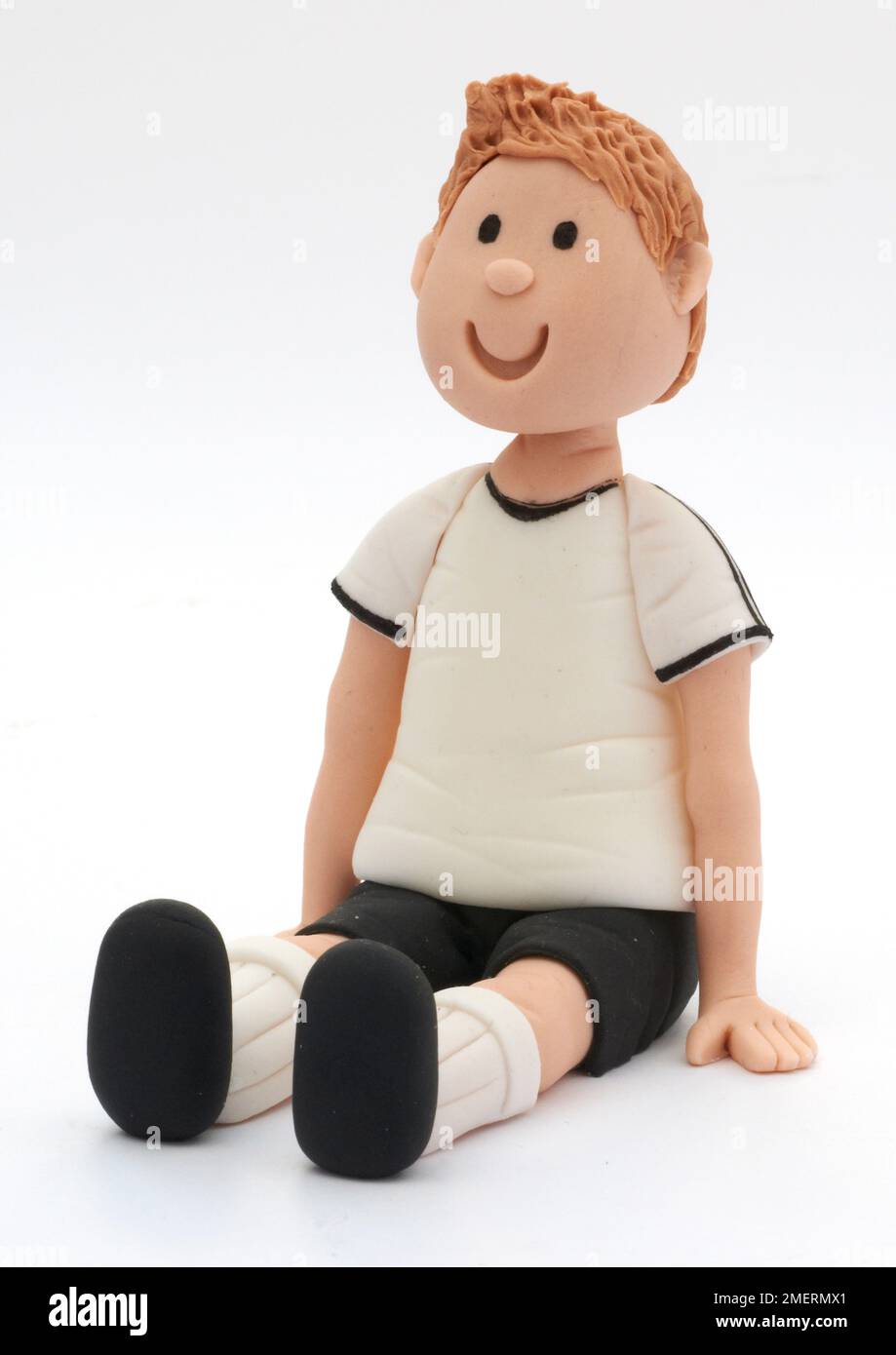 Footballer made of fondant icing Stock Photo - Alamy