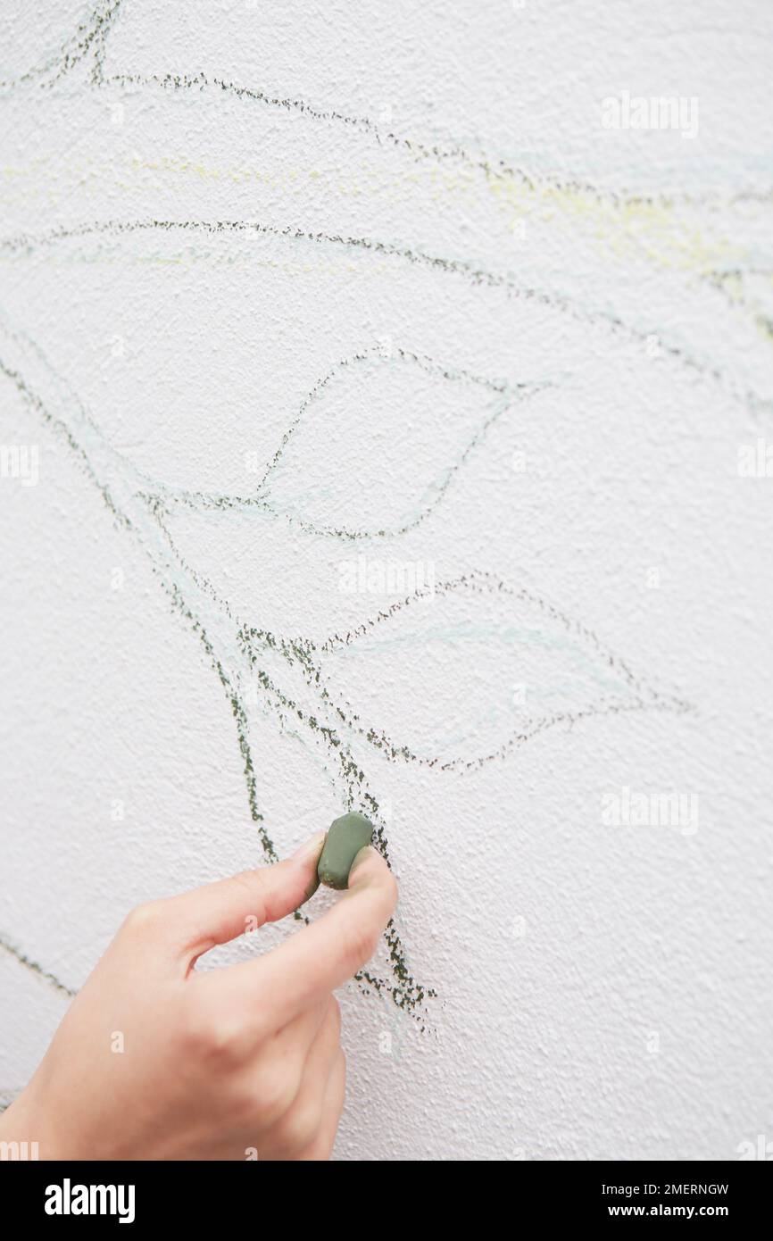 Drawing tree design on outer wall Stock Photo - Alamy