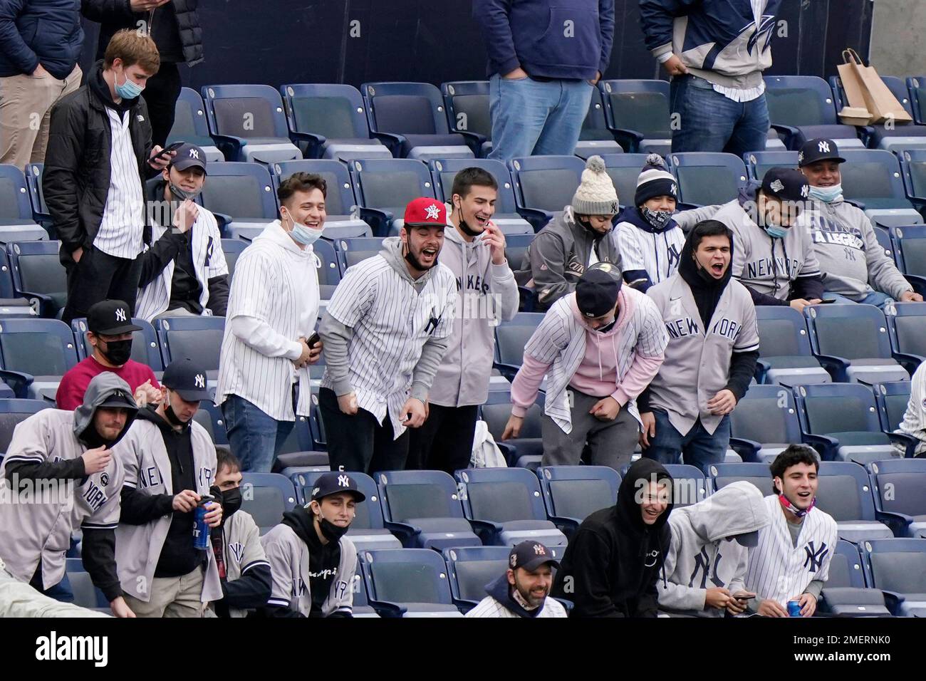 New York Yankees fans taunt a Toronto Blue Jays outfielder before a ...