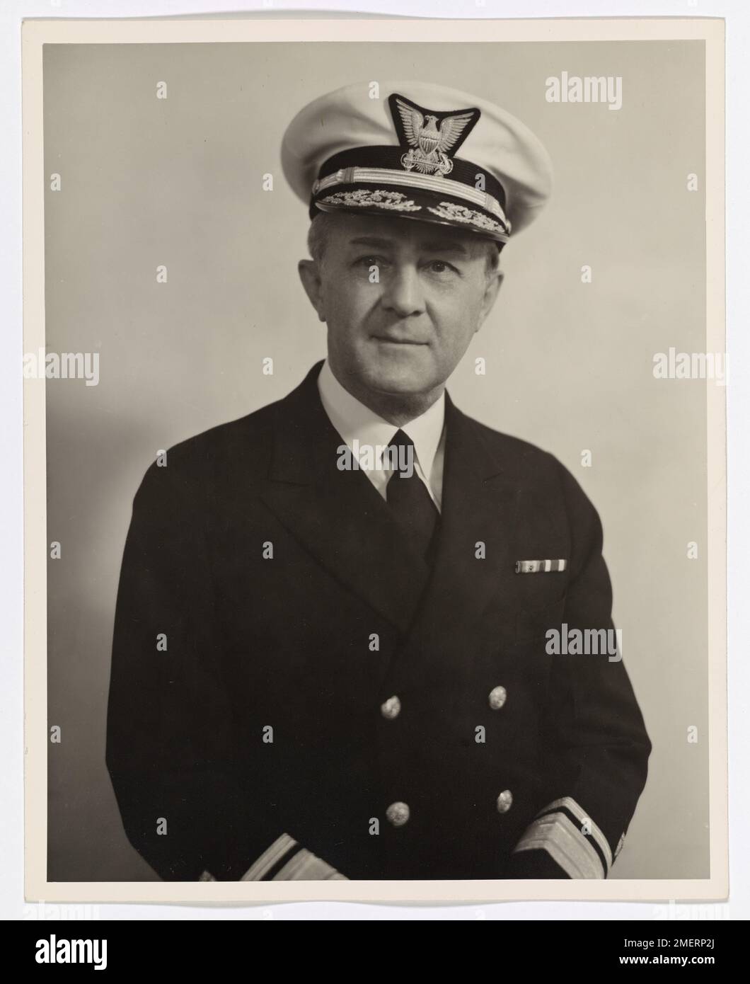 This photograph features Rear Admiral Covell, a senior officer in the U ...