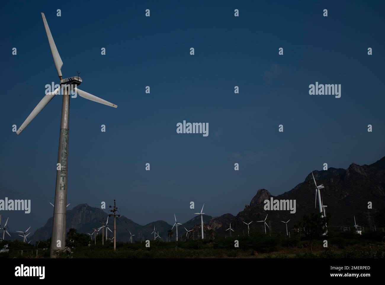 Three-bladed wind turbines at one of Asia's largest wind farms are seen ...