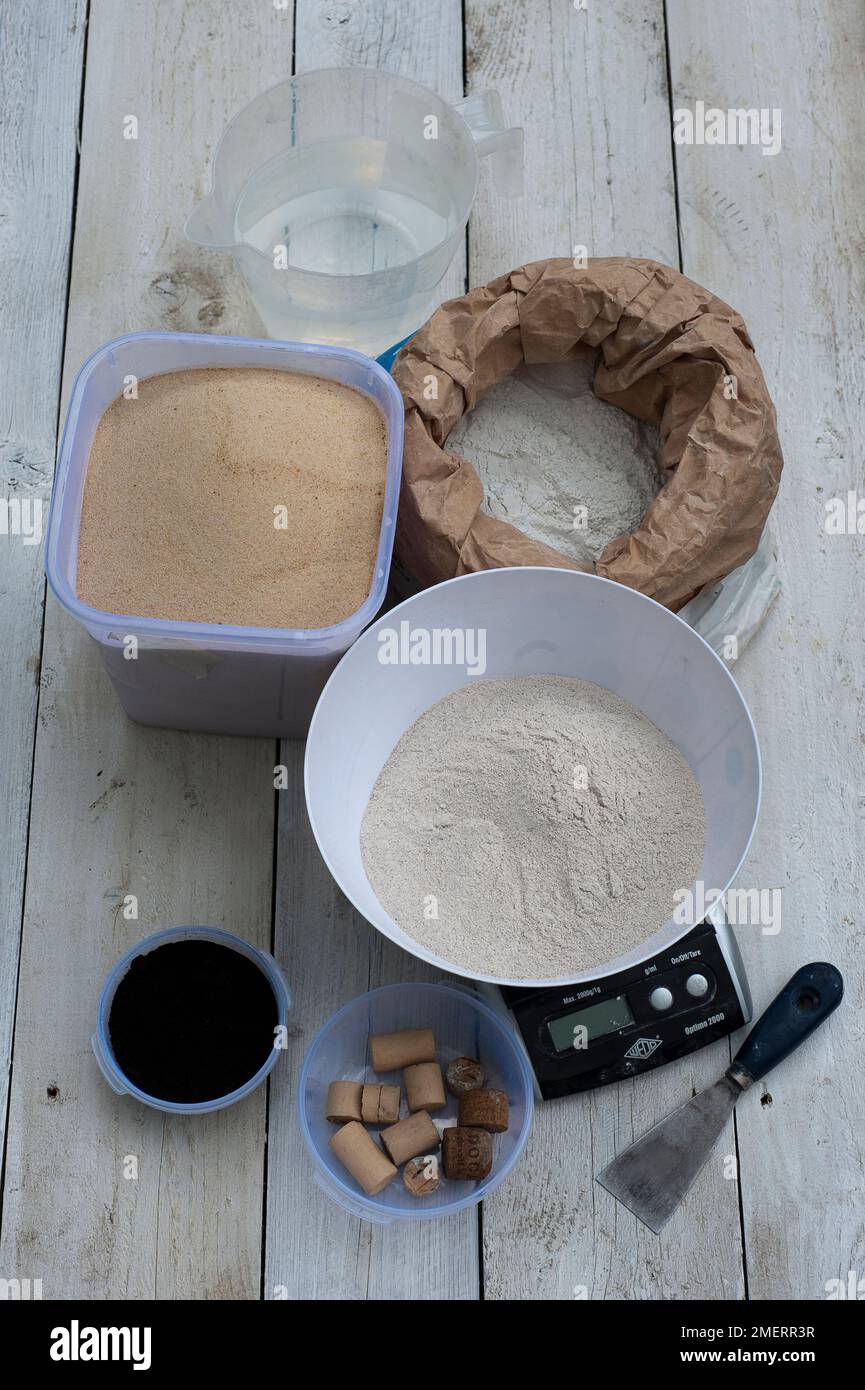 Making concrete planter, ingredients including cement, sand, water ...