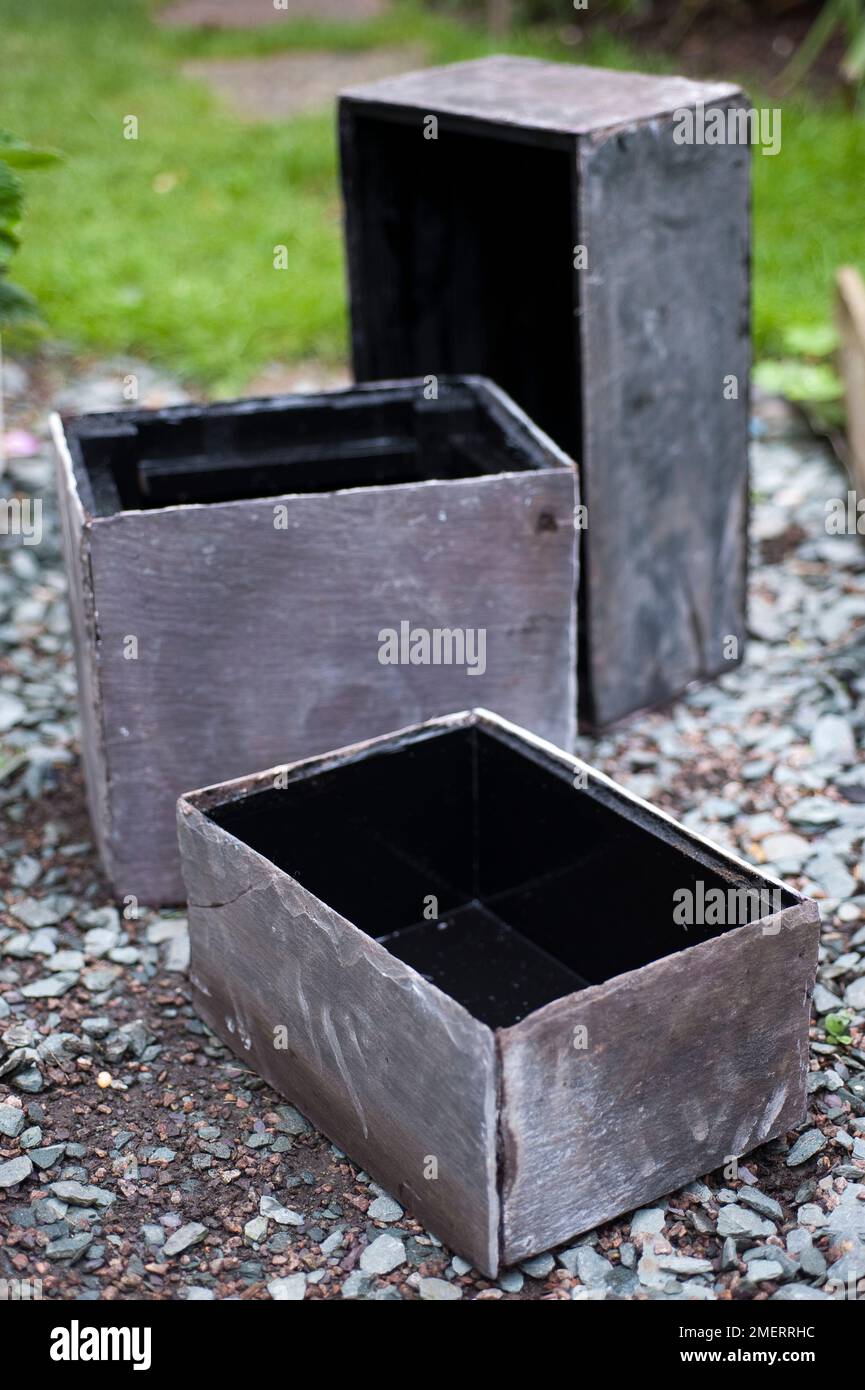 Slate box planters Stock Photo - Alamy