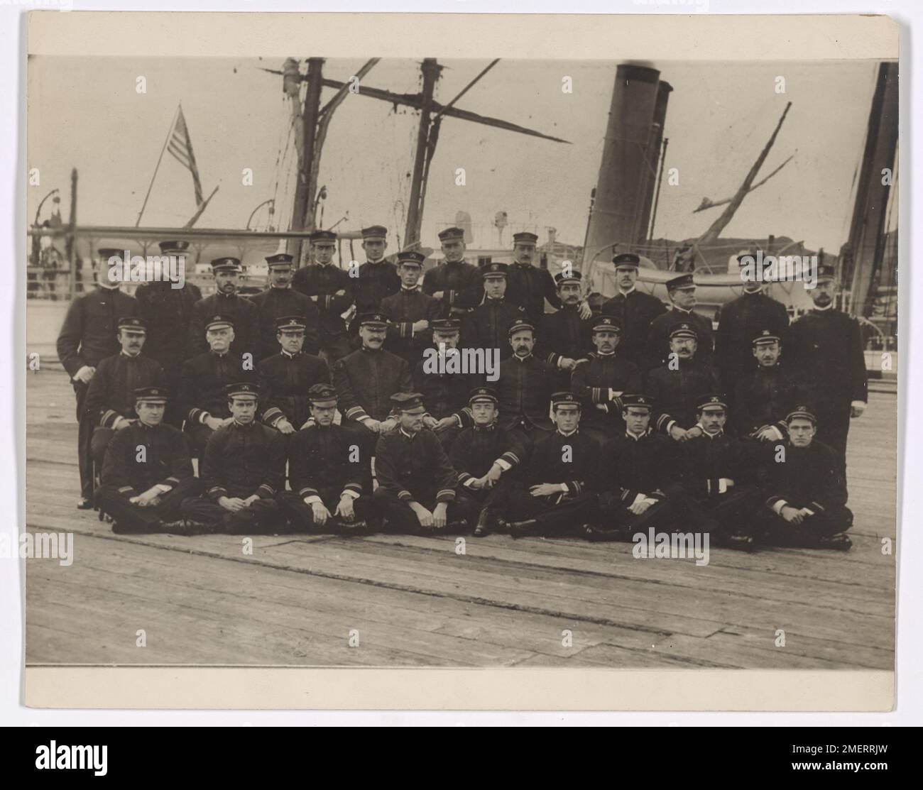 A group photograph of Coast Guardsmen, capturing the camaraderie and ...