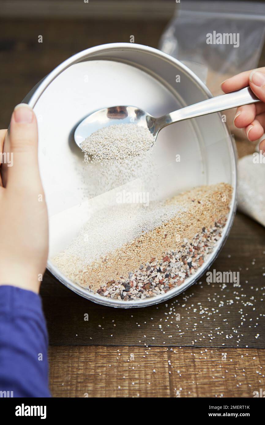 Hand holding spoon air hi-res stock photography and images - Alamy