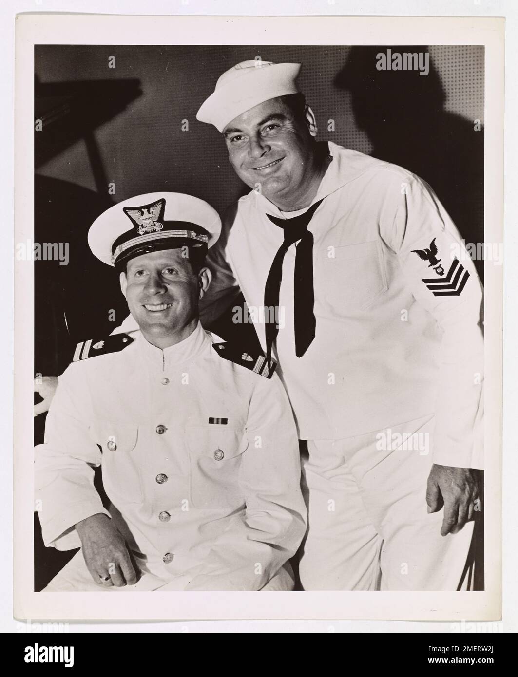 This photo captures Jimmy Grier and Rudy Vallee, known personalities ...
