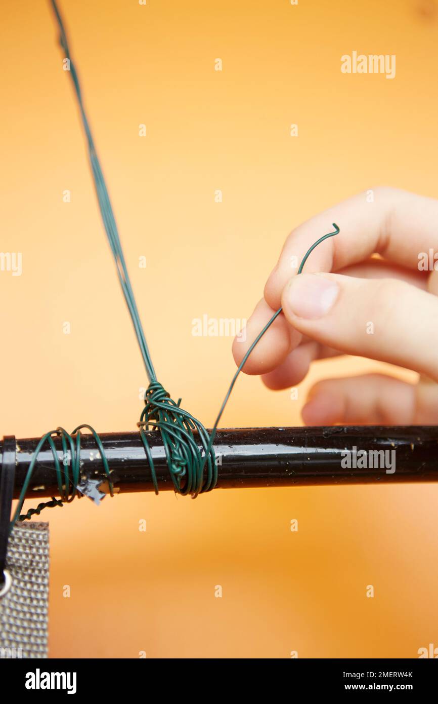 Tying wire hi-res stock photography and images - Alamy