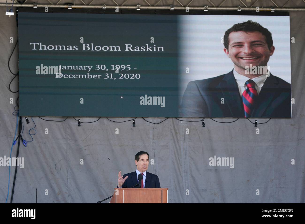 Rep. Jamie Raskin, D-Md., speaks below an image of his son Tommy Raskin ...