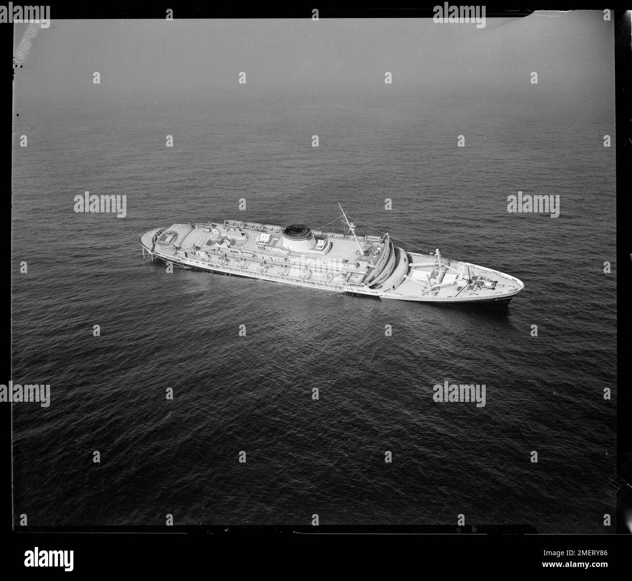 Aerial view of the SS ANDREA DORIA listing to starboard during its ...