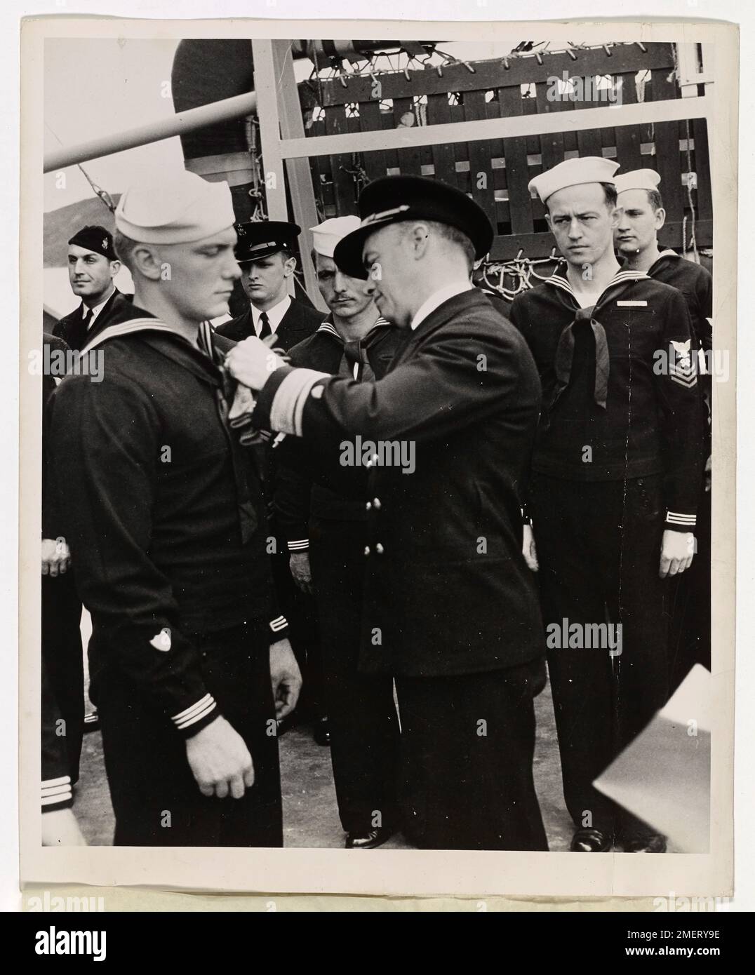 Coast Guardsman Victor R. Peterson receives a letter of commendation ...