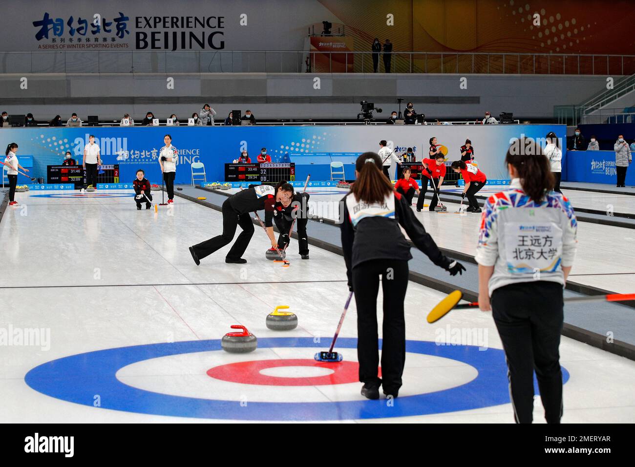 Local teams compete in a curling competition during a test event for ...