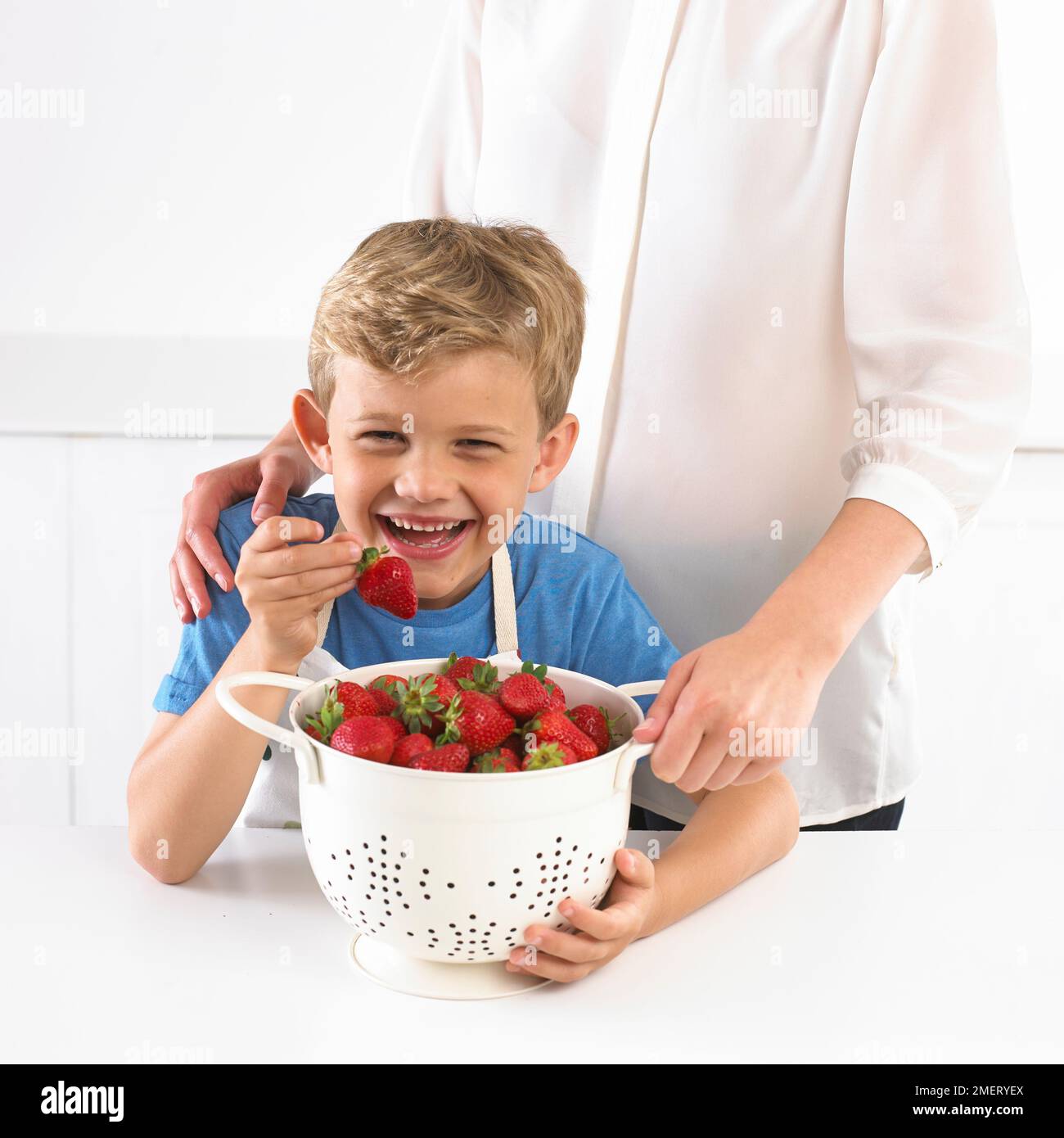 Boy mouth berries hi-res stock photography and images - Alamy