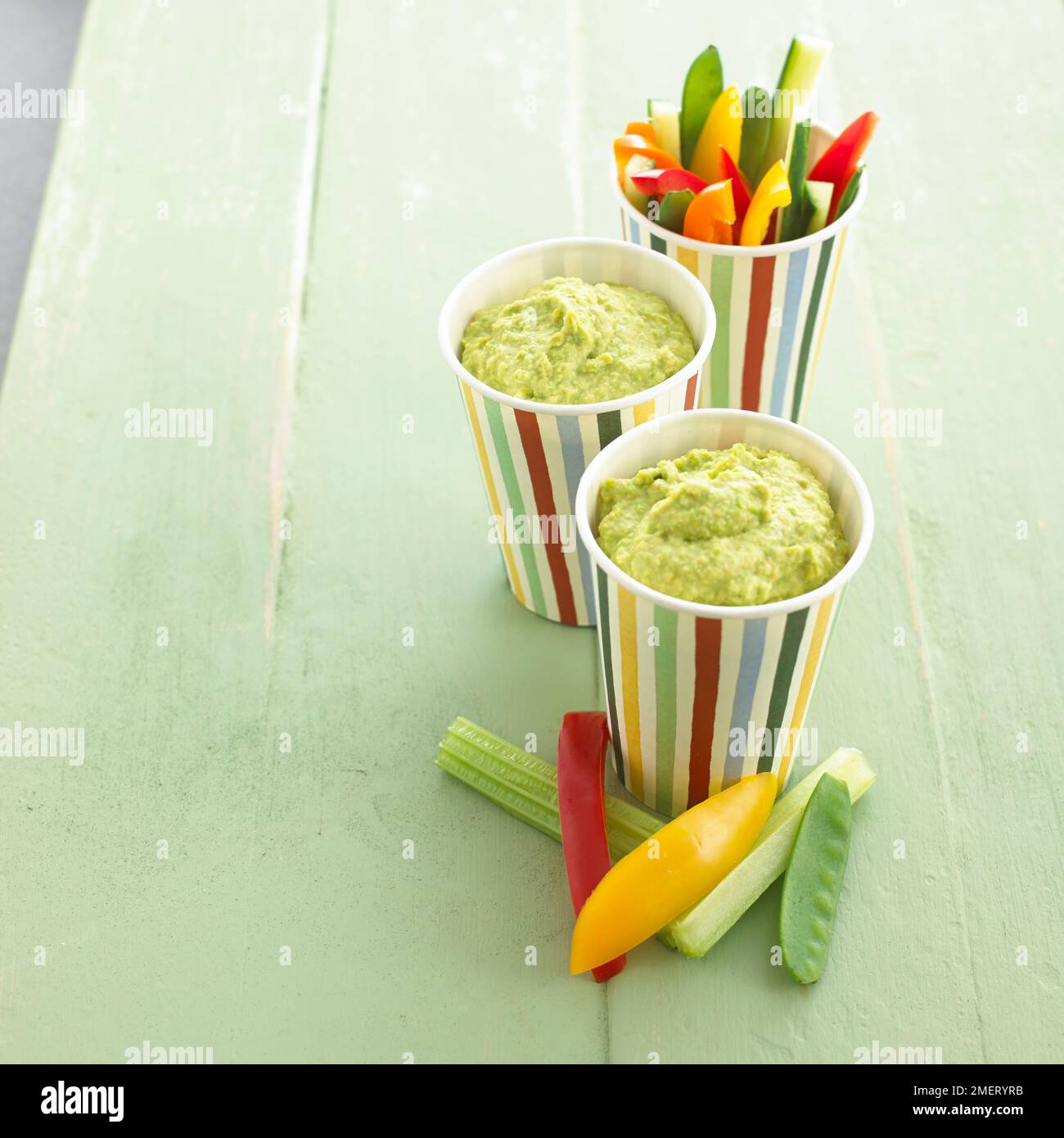 Cups of pea hummus and sticks of vegetable Stock Photo - Alamy