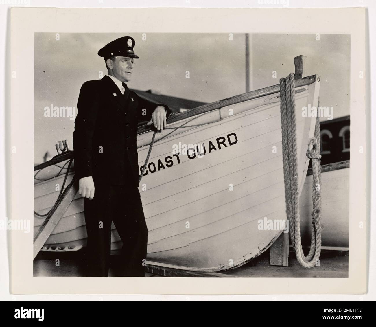 A man wears the uniform of unlicensed enrollees in the Maritime Service ...