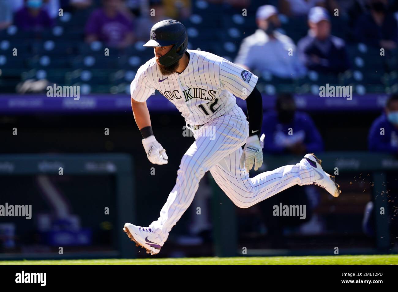 Colorado Rockies second baseman Chris Owings (12) in the third inning ...