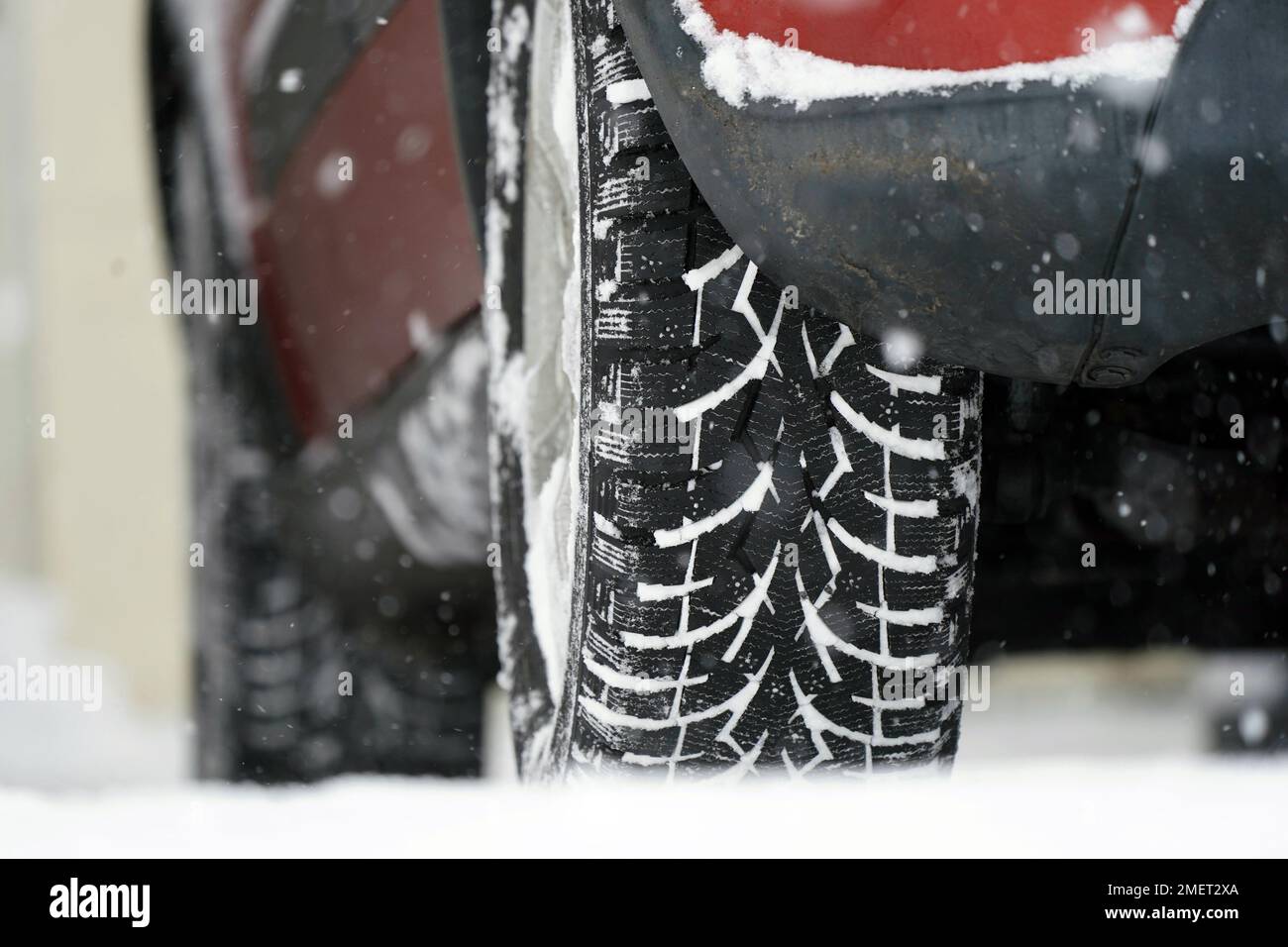 Car with snow tires hi-res stock photography and images - Alamy