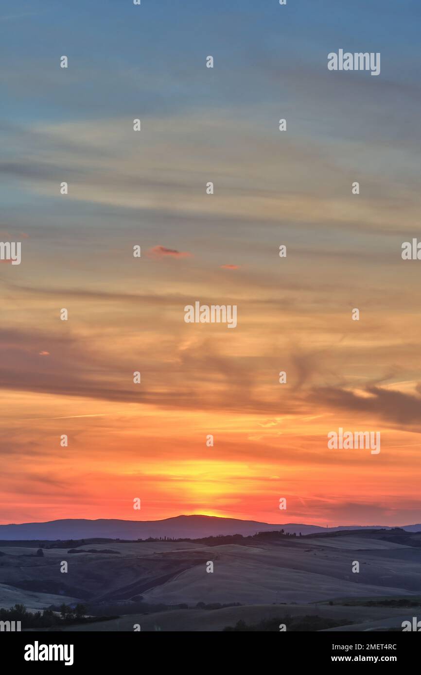 Tuscan sunset with rolling hills in the distance, Tuscany, Italy Stock ...