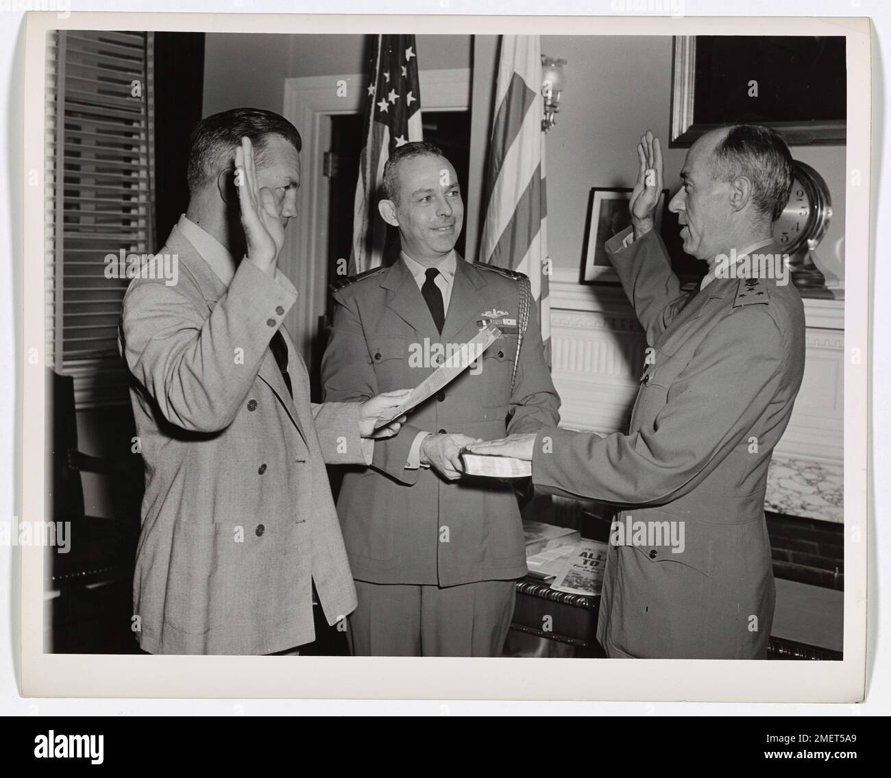 Vice Admiral R. R. Waesche is sworn in for his third four-year term as ...