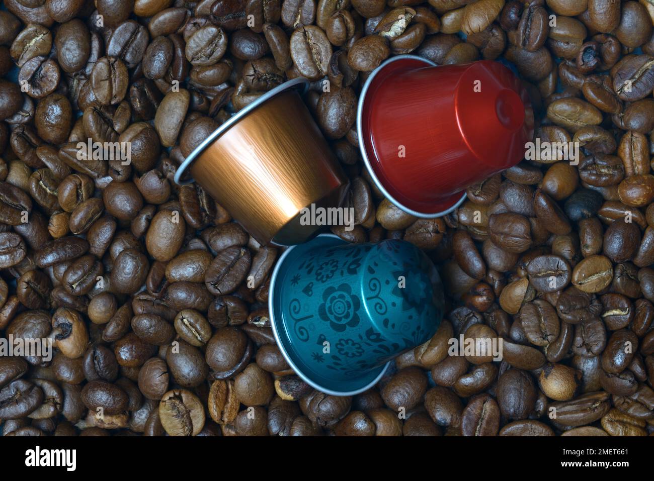 Coffee capsules and coffee beans Stock Photo - Alamy