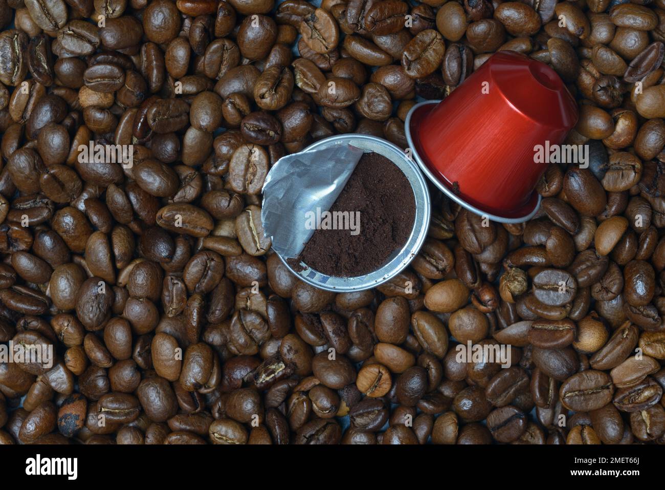 Coffee capsules and coffee beans Stock Photo - Alamy