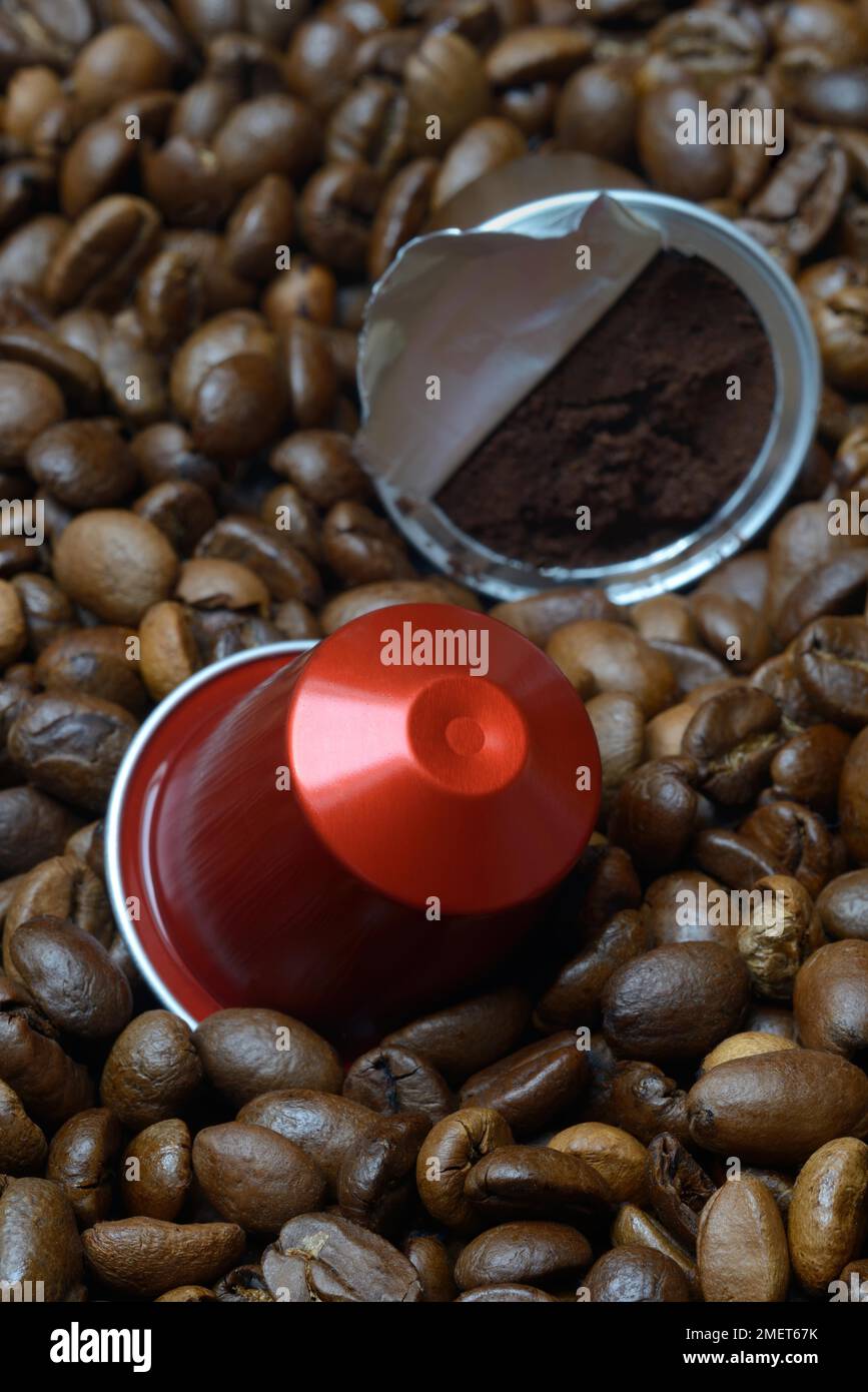 Coffee capsules and coffee beans Stock Photo - Alamy