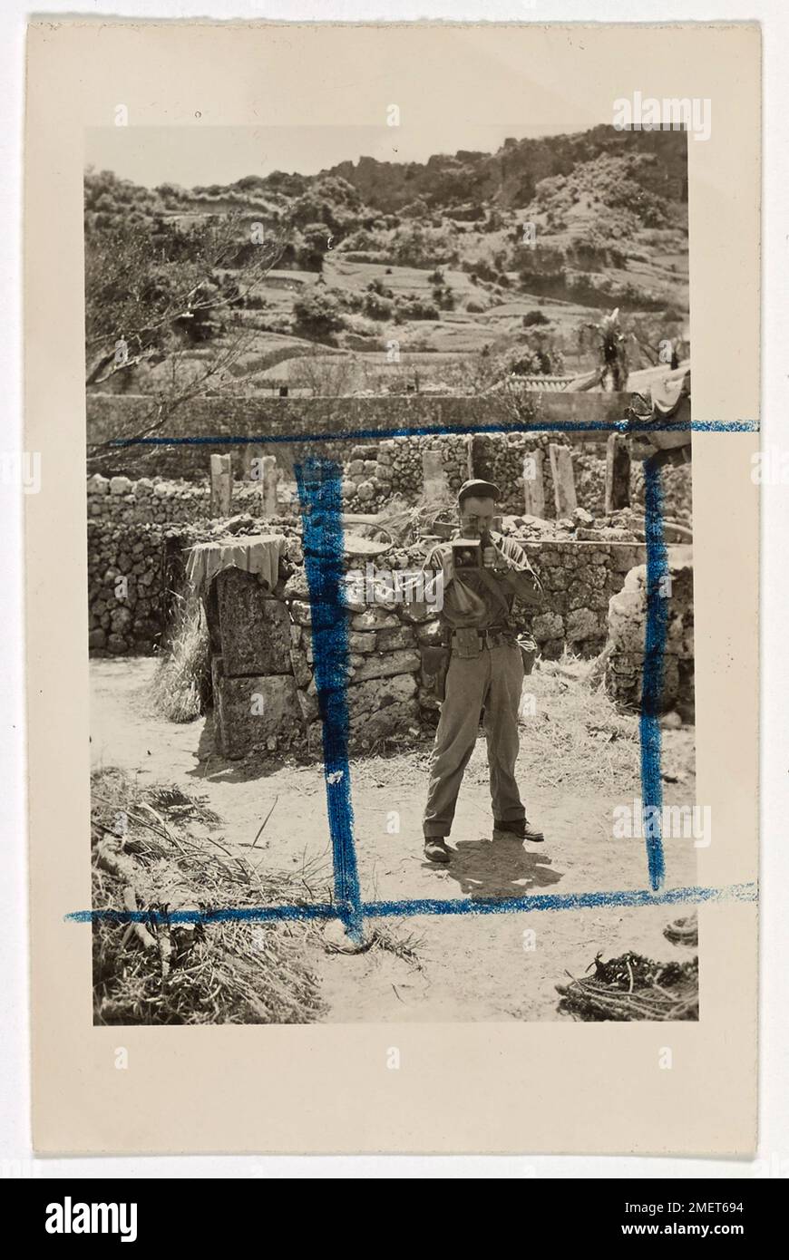 Coast Guard Combat Photographer Charles W. Cook is shown capturing ...