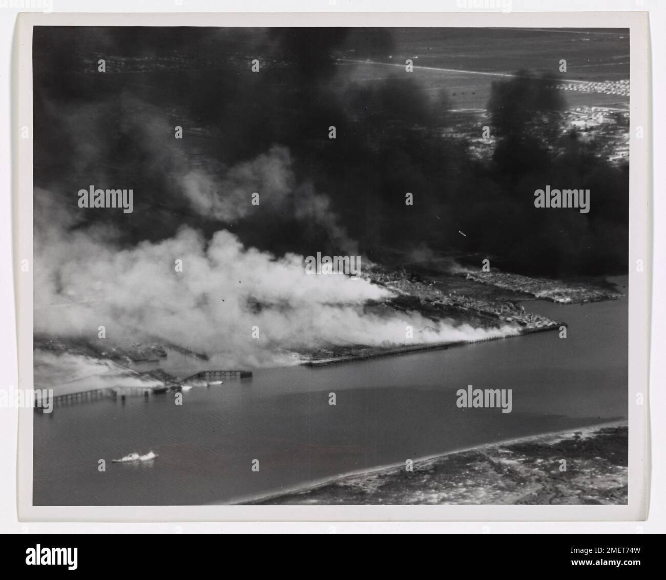 An aerial view captures the devastating fires and explosions of the ...