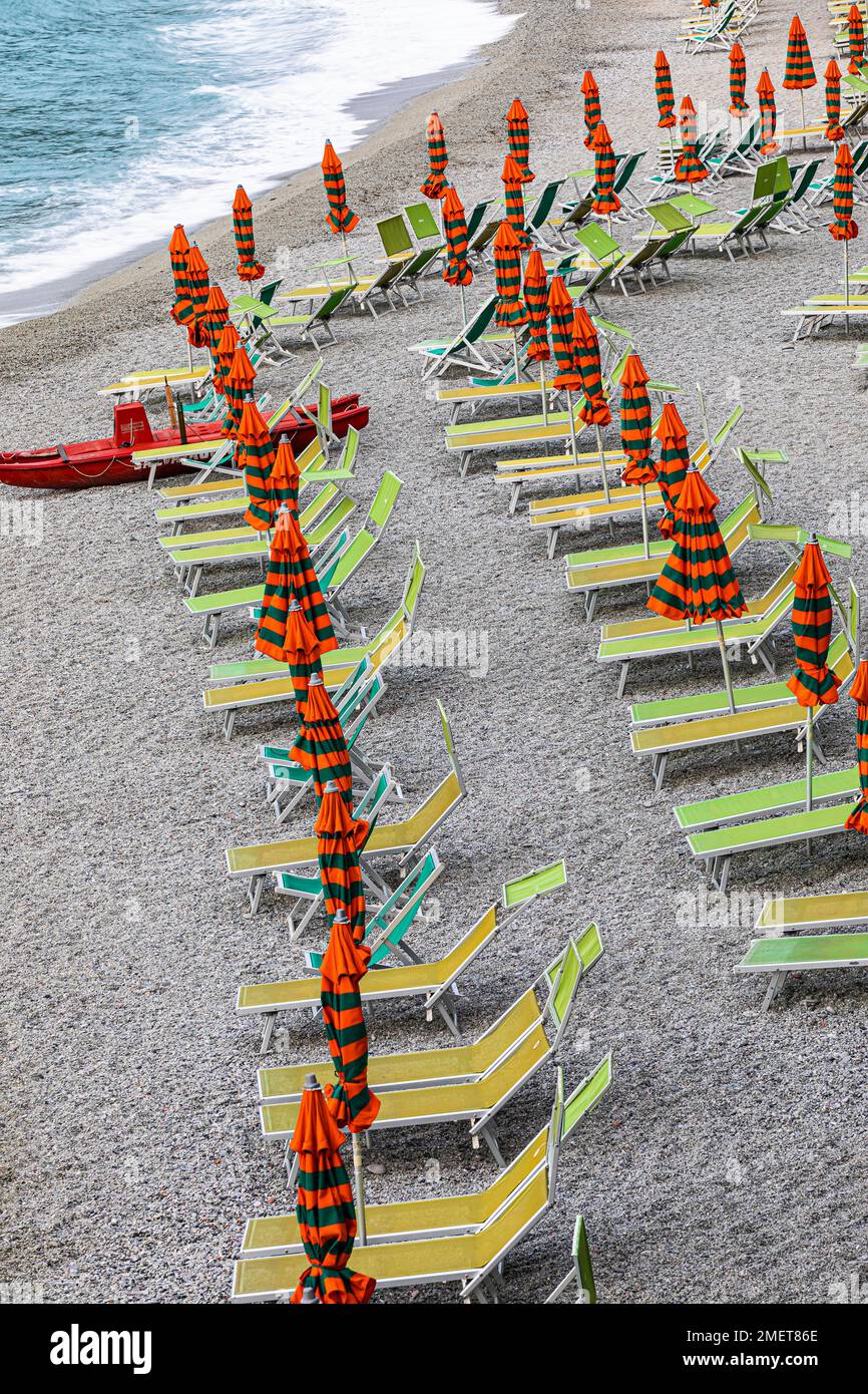 Sunbeds and umbrellas at the beach di Fegina in Monterosso al Mare ...