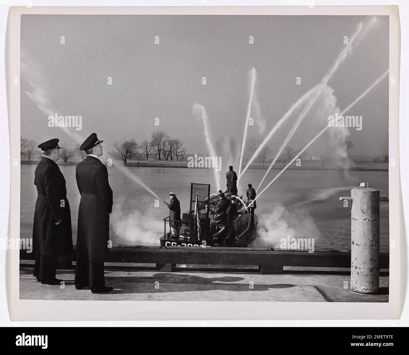 Vice Admiral Russell R. Waesche and Captain Norman B. Hall inspect ...