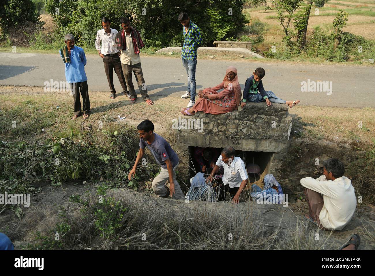 FILE - In this May 14,2017, file photo, Indian civilians take temporary ...
