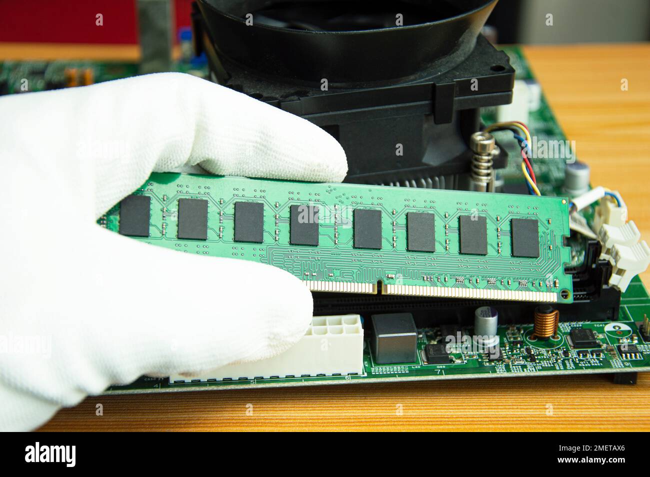 side view mechanic holding ram of the computer motherboard Stock Photo ...