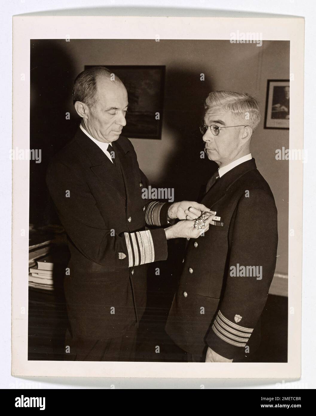 Admiral Russell R. Waesche, Commandant of the U.S. Coast Guard, is seen ...