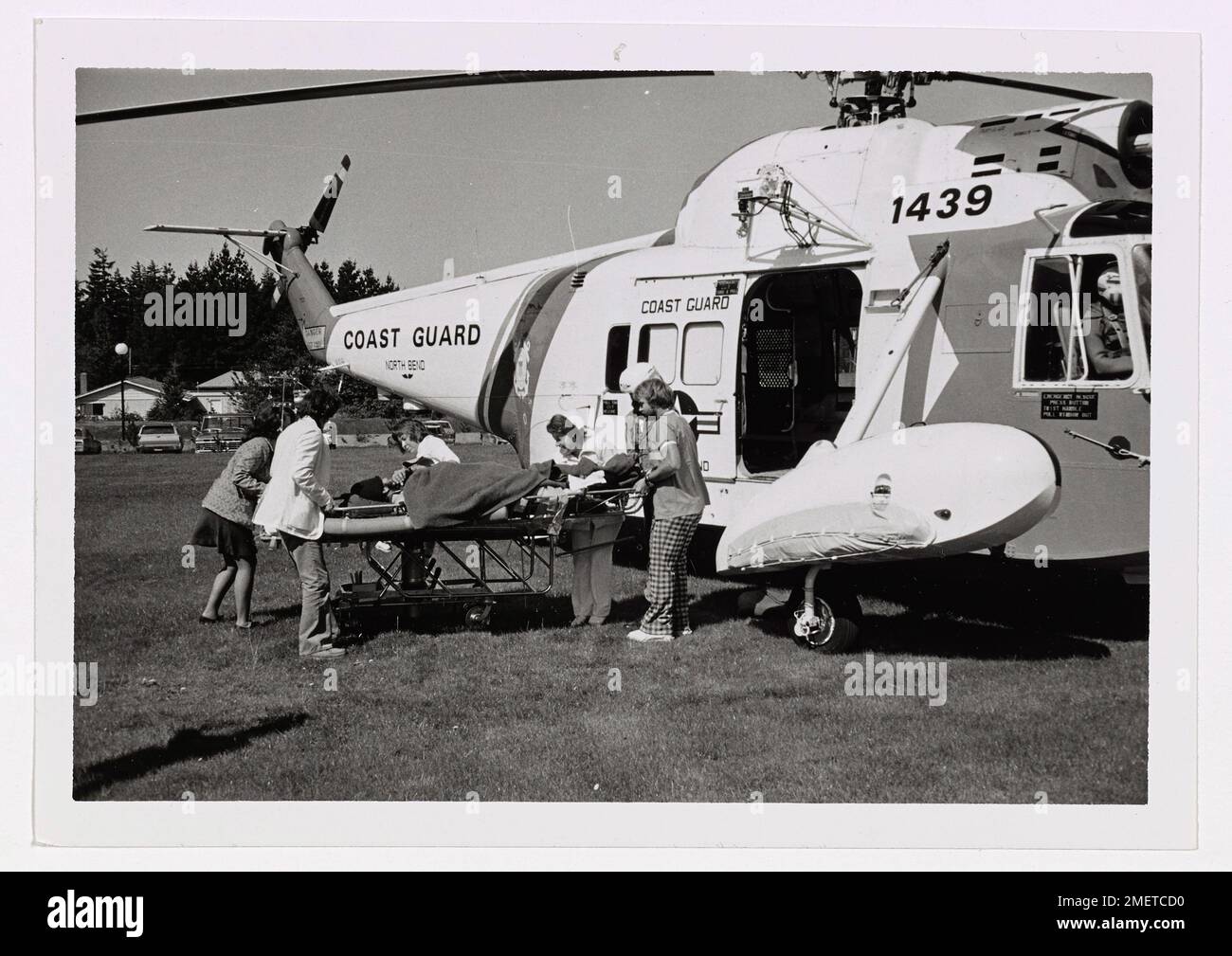 A Coast Guard helicopter, piloted by Lieutenant Commander Roger Love ...