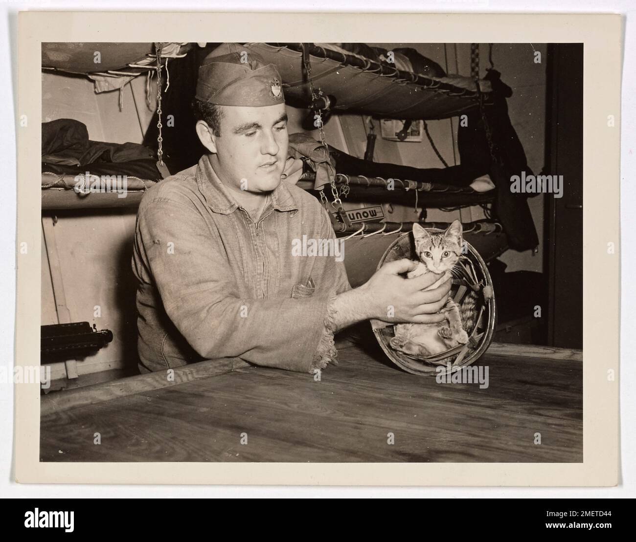 Chief Electrician's Mate Albert R. McNeely of China Grove, N.C., puts ...