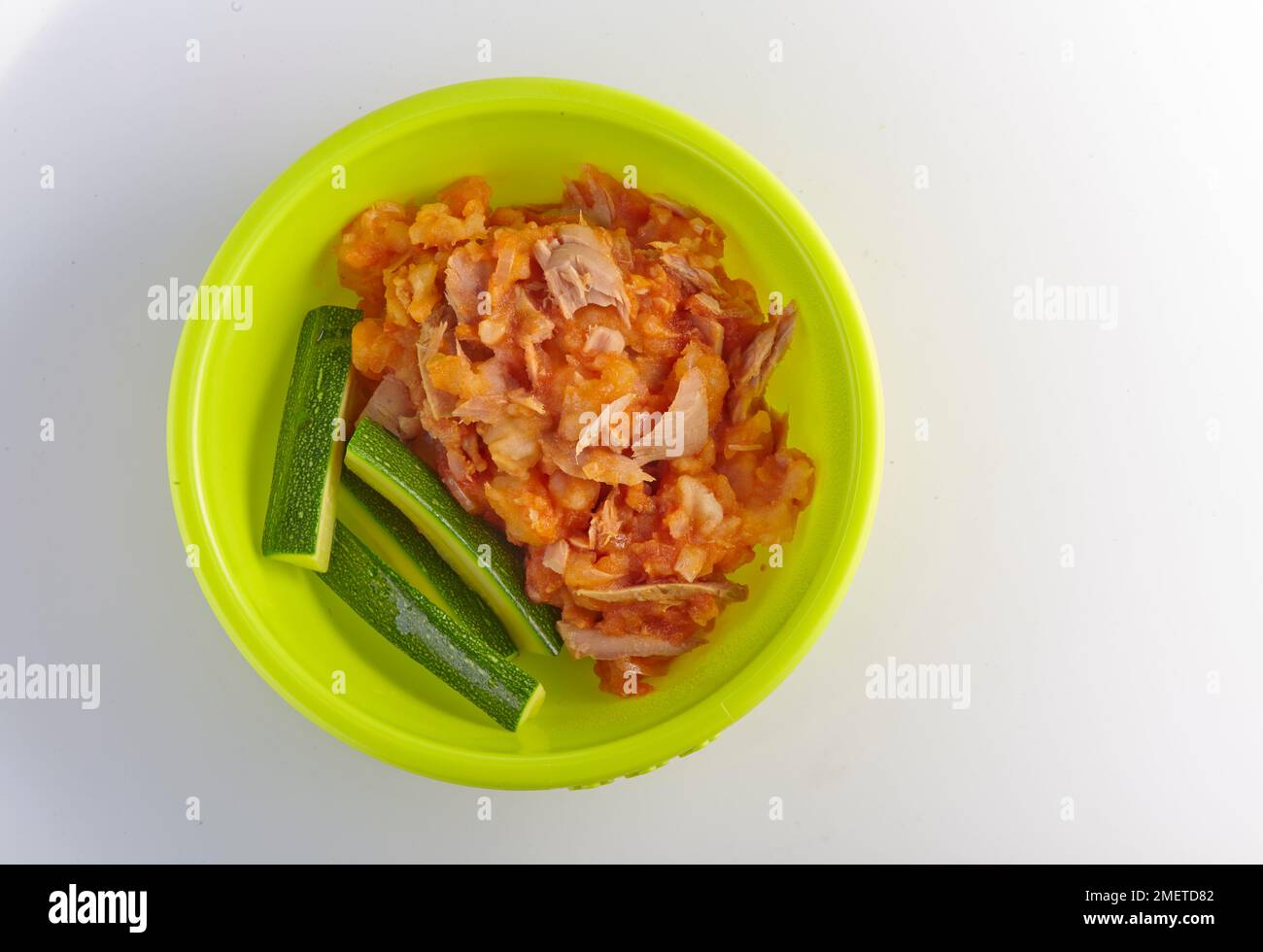 Italian tomato and tuna mash with courgette sticks Stock Photo - Alamy