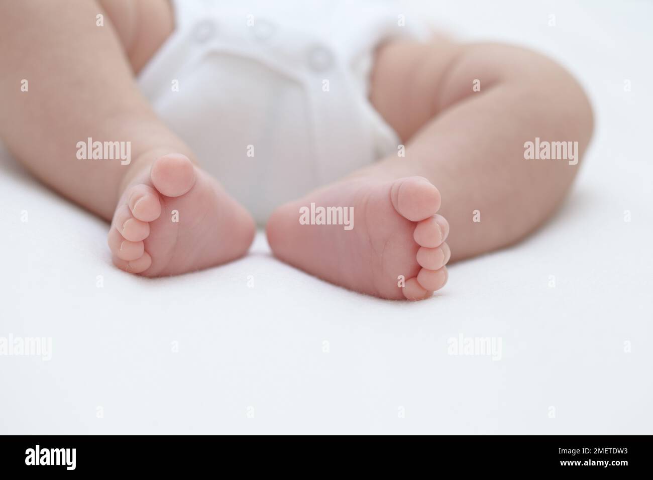 Feet of baby girl (6 weeks Stock Photo - Alamy