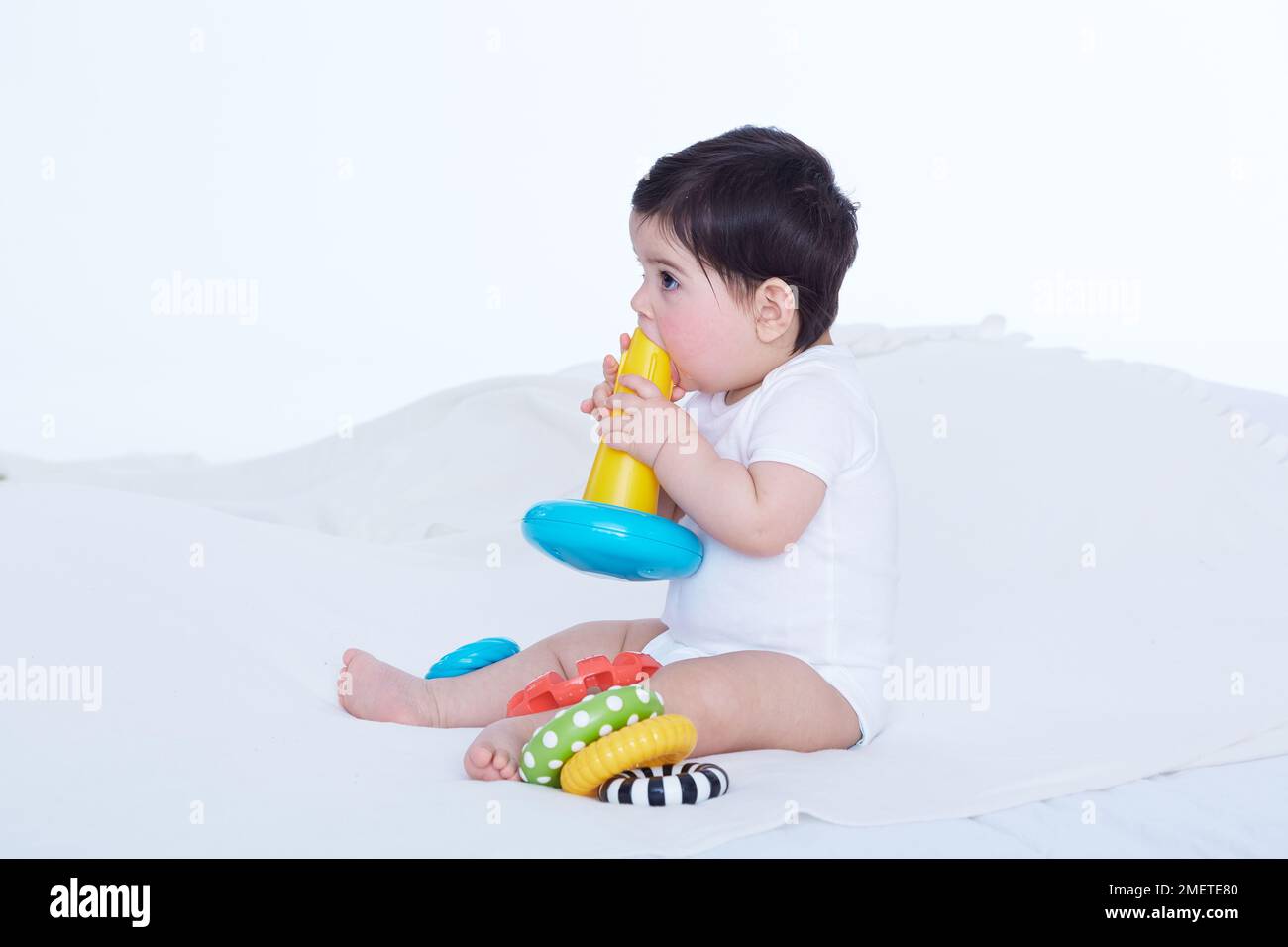 Baby biting toy hi-res stock photography and images - Alamy