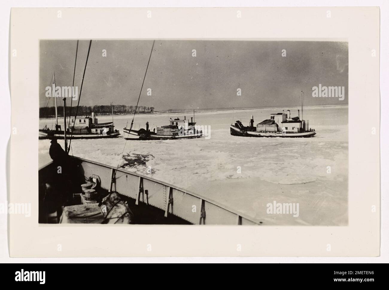 The Coast Guard boat 'Jackson' is shown freeing small boats from the ...