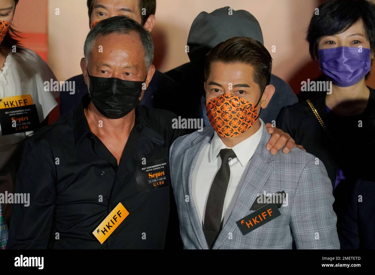 Hong Kong director Johnnie To, left, and actor Aaron kwok, pose for ...
