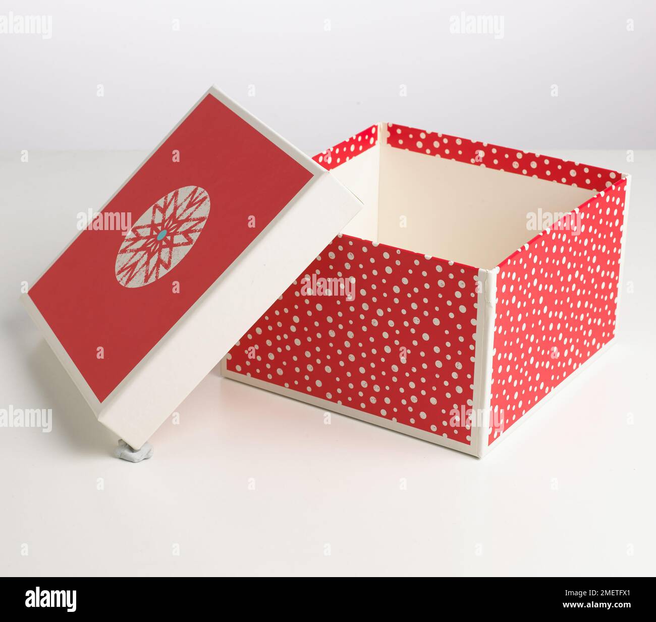 Red spotted box with lid Stock Photo - Alamy