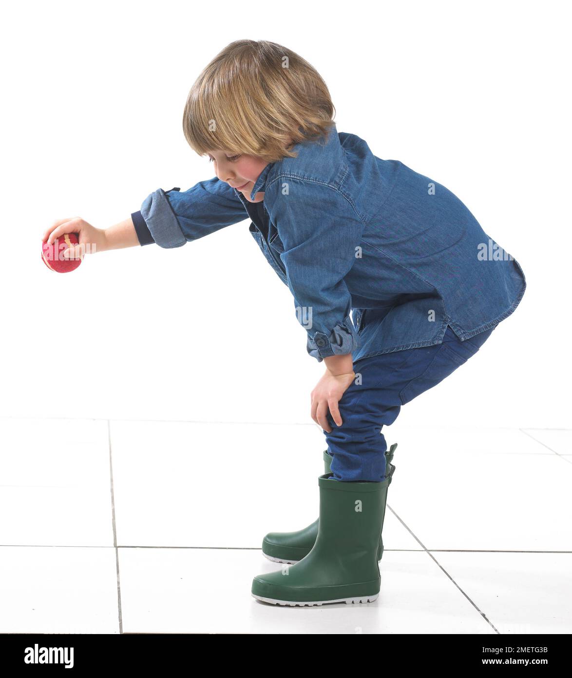 Child bending over boy hi-res stock photography and images - Alamy