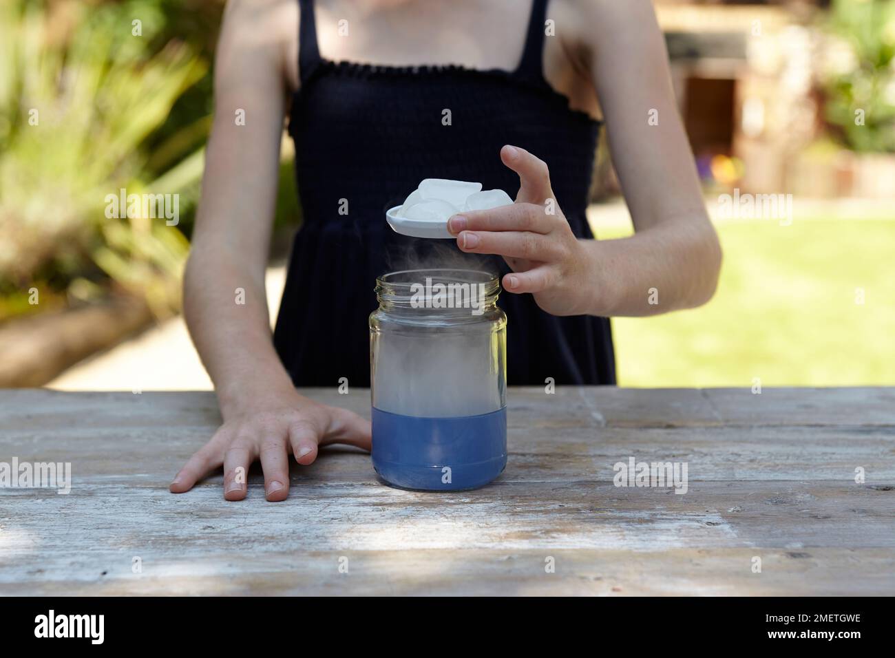 Making a cloud in a jar Stock Photo - Alamy