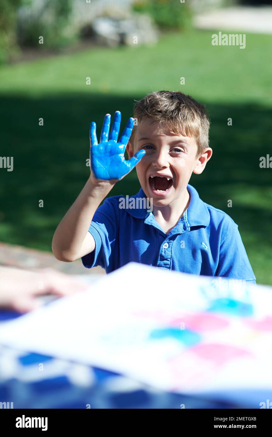 Making hand prints Stock Photo - Alamy