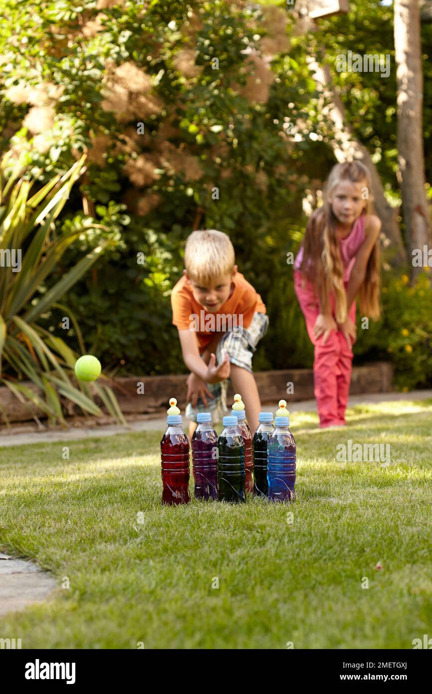Skittle game, using recycled plastic bottles Stock Photo - Alamy