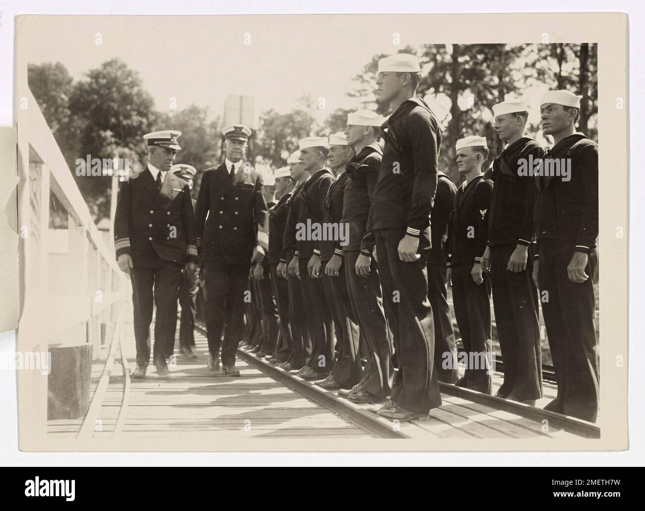 Admiral Billard and Captain Gamble inspect the Coast Guard base in ...