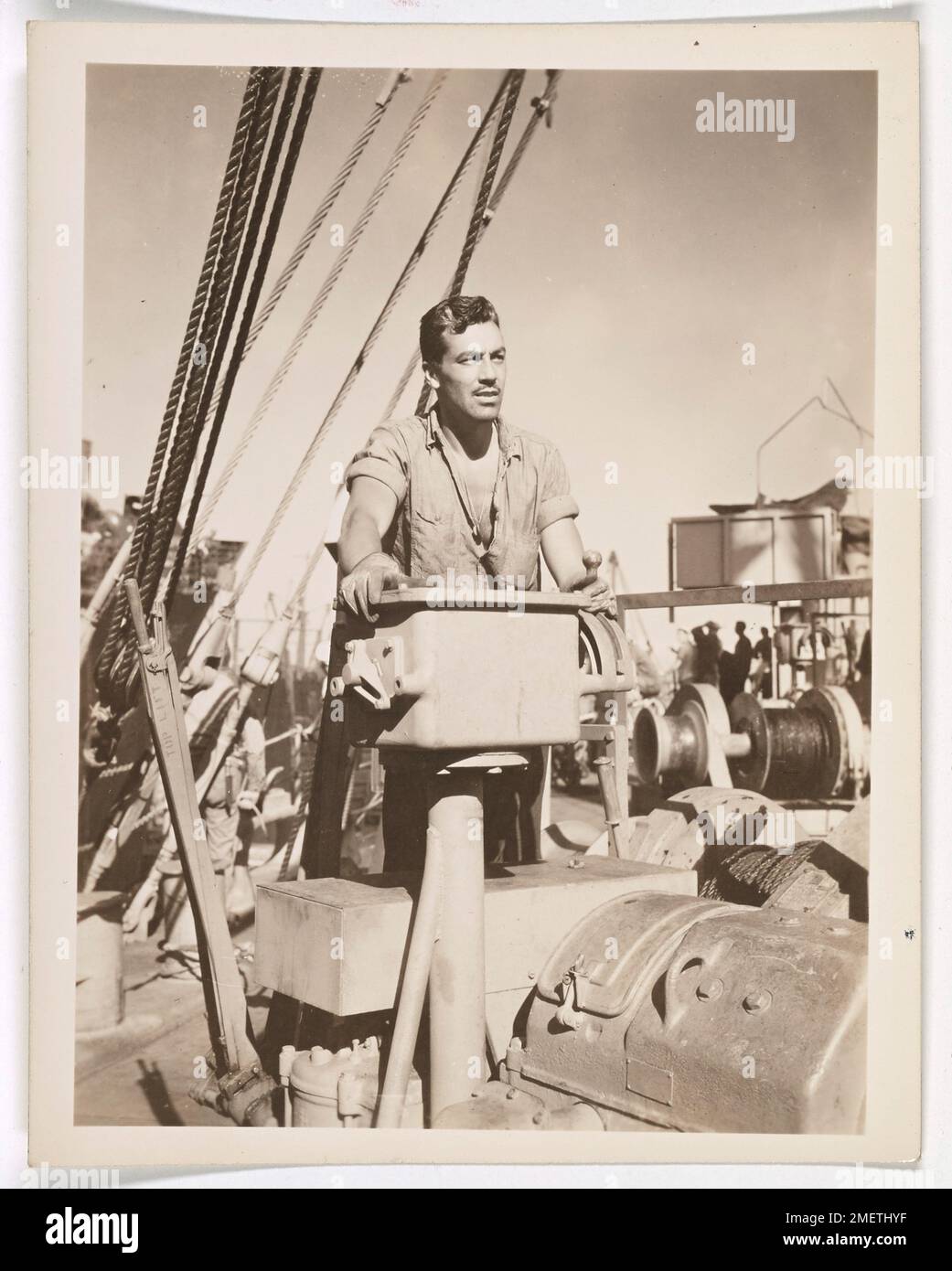 Actor Cesar Romero is photographed aboard a U.S. Coast Guard-manned ...