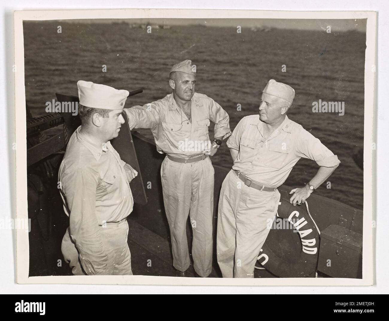 Officers on deck of USS Aquarius. Left to Right - Commander Eskridge ...