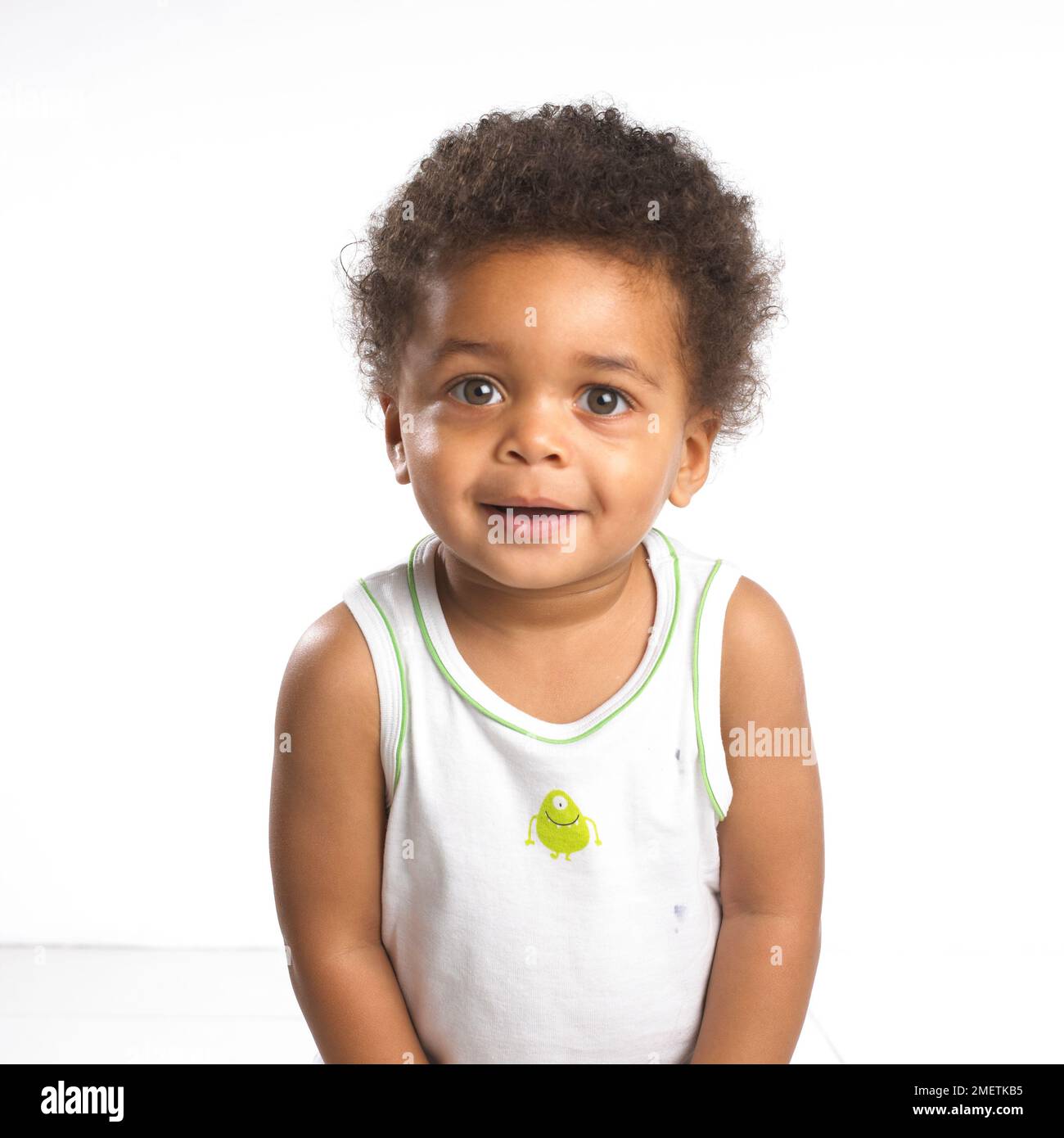 Curly boy looking camera hi-res stock photography and images - Alamy